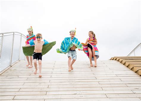 Sloped Decking Creates Waterfront Slides At Faaborg Harbour Bath