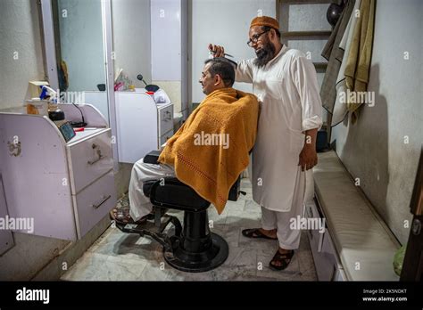 A Customer In A Barbershop Having His Hair Cut Peshawar Khyber