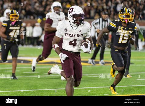 Texas Aandm Running Back Rueben Owens Ii Runs The Ball During The Second