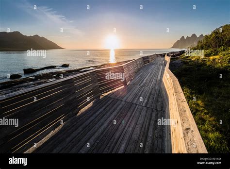Coast At Tungeneset Sunset Over The Fjord Wooden Path View Over Rock