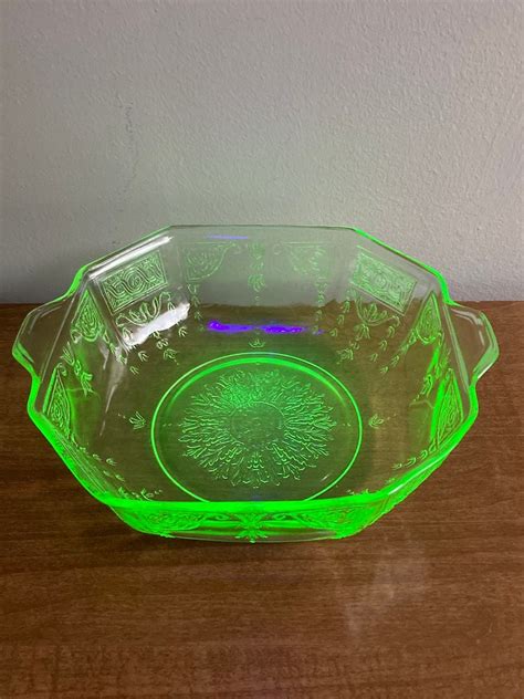 Vintage Uranium Glassware Under A Blacklight Casts An Eerie Green Glow My Modern Met