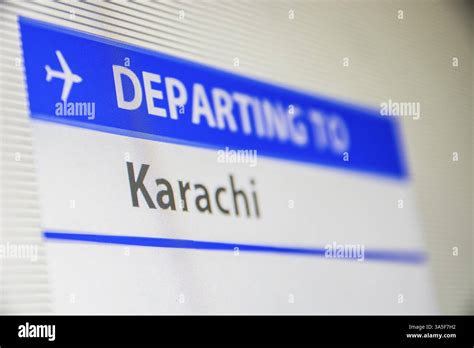 Computer Screen Close Up Of Status Of Flight Departing To Karachi