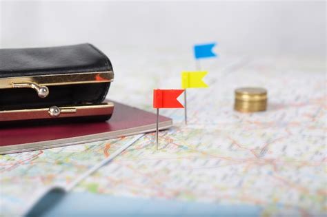 Premium Photo Wallet Coins Pass On A Map Closeup
