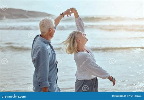 A Happy Mature Caucasian Couple Enjoying Fresh Air On Vacation At The