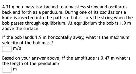 solved an object attached to a spring oscillates