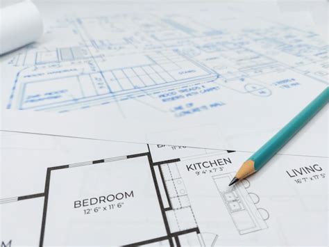 Premium Photo Architectural Blueprints And Pencil For The Project Drawings