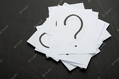 Premium Photo Question Mark Heap On Table Concept For Confusion
