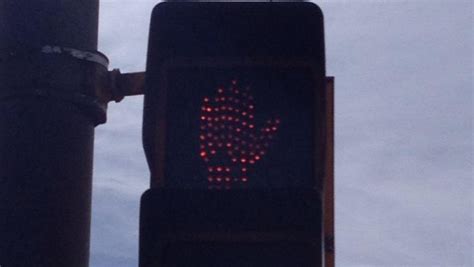 Broken Traffic Signal Flips Off Pedestrians