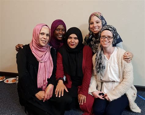 Sisters Swapping Hijabs Embrace
