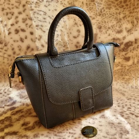 خرید و قیمت کیف زنانه چرم طبیعی گاوی و دست دوز طرح یوتاب محصول آلماچرم