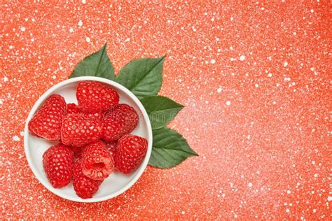 Fresh Red Raspberry On Color Background With Green Leaves Ingredients