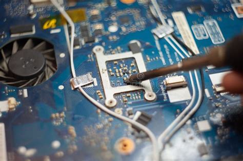 Close Up Macro Shot Of Electronic Factory Machine At Work Printed