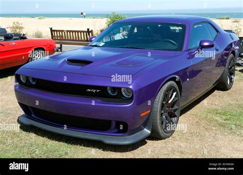Three Quarters Front View Of A Dodge Hellcat Challenger Srt On Display