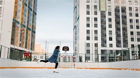 Premium Photo Professional Female Ice Figure Skater Practicing Spinning On Outdoor Skating