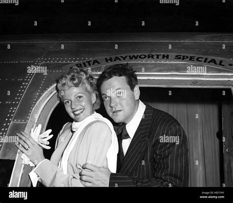 Rita Hayworth And Husband Orson Welles Board A Special Lockheed Flight