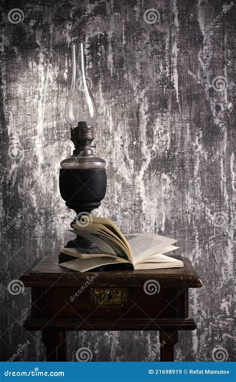 Old Kerosene Lamp And Open Book Stock Image Image Of Open Antique 21698919