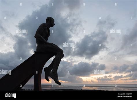 Symmetrical Patterns On The Electricity Pylon Cloudy Blue And White Sky Trailing Wires And