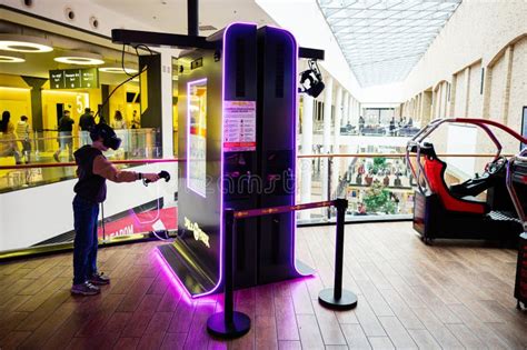 virtual reality gaming experience inside a modern shopping mall center