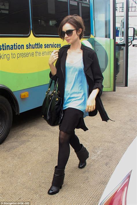 Lily Collins Shows Her Fashion Savvy In Chic Ensemble As She Arrives At Lax Daily Mail Online