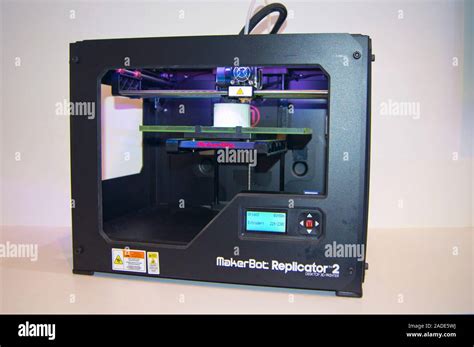 a makerbot replicator 2 3d printer designed to produce plastic objects