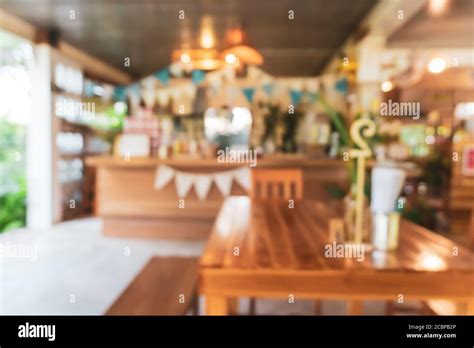 Blur Coffee And Restutant Cafe With Customers Background Vintage Tone
