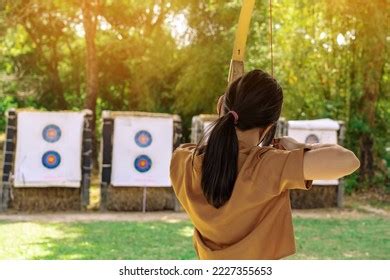 Shooting A Bow Back View Over 55 325 Royalty Free Licensable Stock