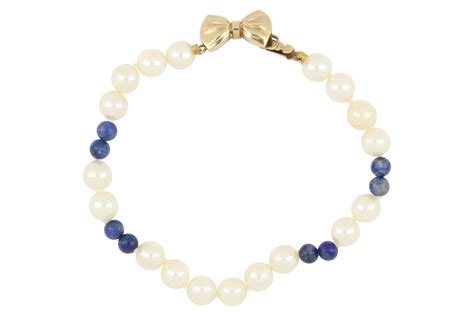 Lot Saltwater Pearl And Lapis Lazuli Bracelet With 9ct Gold Bow Clasp