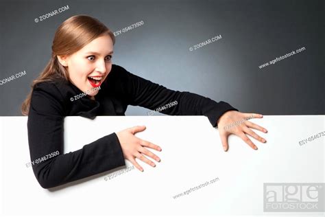 Wide Eyed Woman With Red Lips Looking Down In Surprise Stock Photo Picture And Low Budget