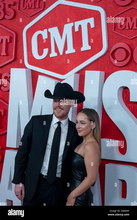 Country Musicians Tate Matthew Renner Left And Lily Pearl Black Walk