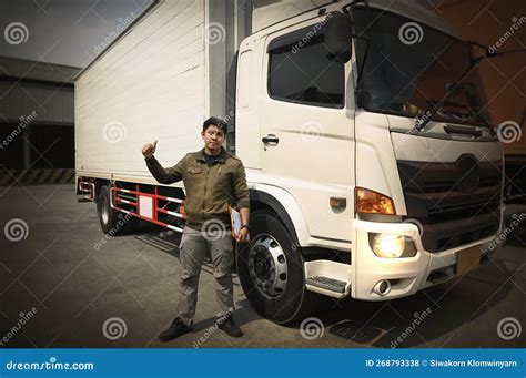 Asian Truck Driver Standing With Cargo Trucks Shipping Container Asian Truck Driver Standing With Cargo Trucks Shipping Container