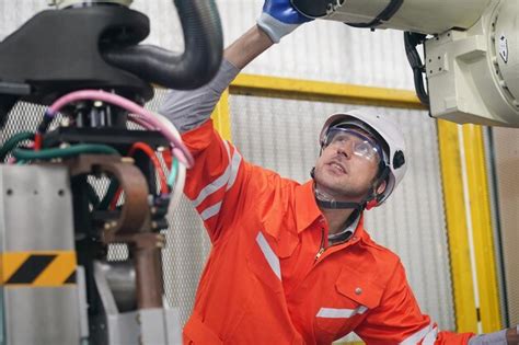 premium photo robotics control engineers solve problems and setting