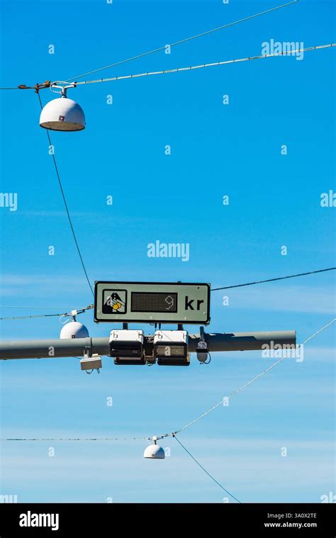 A Modern Traffic Signal System Is Prominently Displayed Against A Bright Blue Sky In Goteborg