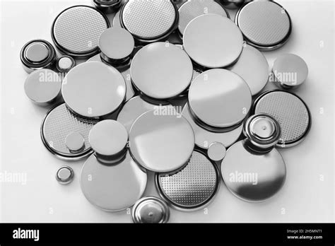 Lithium Button Cell Batteries On Light Background Stock Photo Alamy