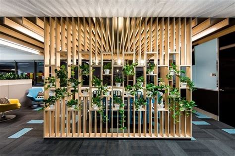 Office With Natural Elements And Wood Partitions