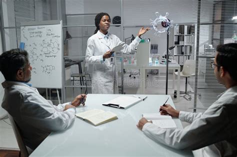 Scientist Presenting Research Findings In Lab Environment Stock Image Image Of Researcher