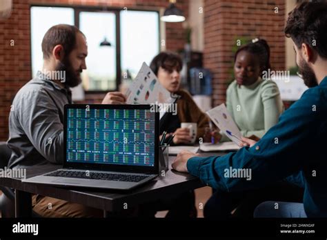 Diverse Businesspeople Discussing Financial Profit Analyzing Stock Data