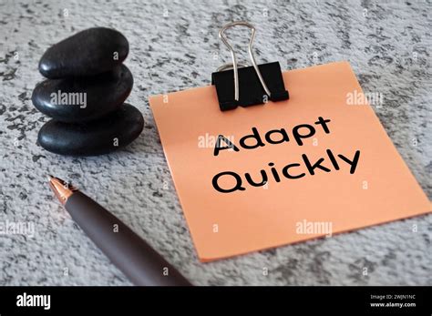 Adapt Quickly Text On Notepad With Zen Stones And Pen Background