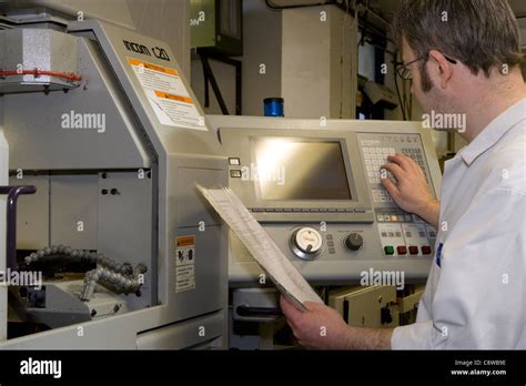 CNC Lathe Operator Programming In Data Setting Up A Task Stock Photo Alamy