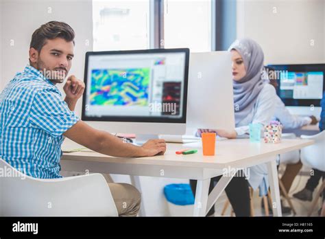 Startup Business Software Developer Working On Desktop Computer Stock