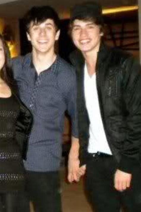 Gregg Sulkin And David Henrie Holding Hands