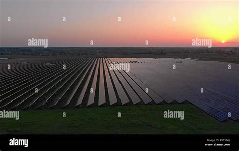 Large Solar Panels At A Solar Farm At Summer Sunset Solar Cell Power