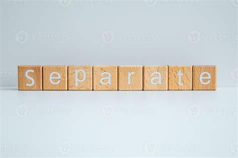 wooden blocks form the text separate against a white background