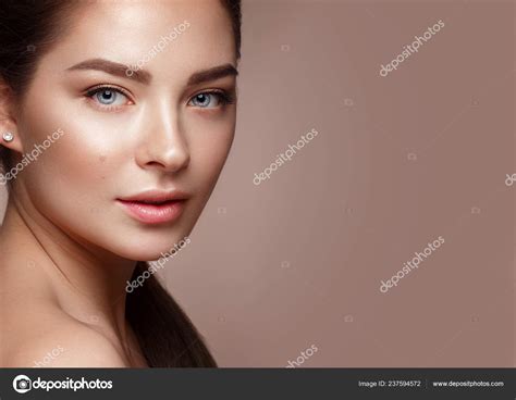 Beautiful Young Girl With Natural Nude Make Up Beauty Face Stock