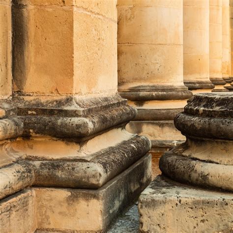 Premium Photo View Of Old Columns