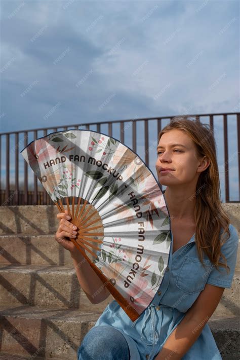 Premium Psd Woman Holding Hand Fan With Mock Up Design