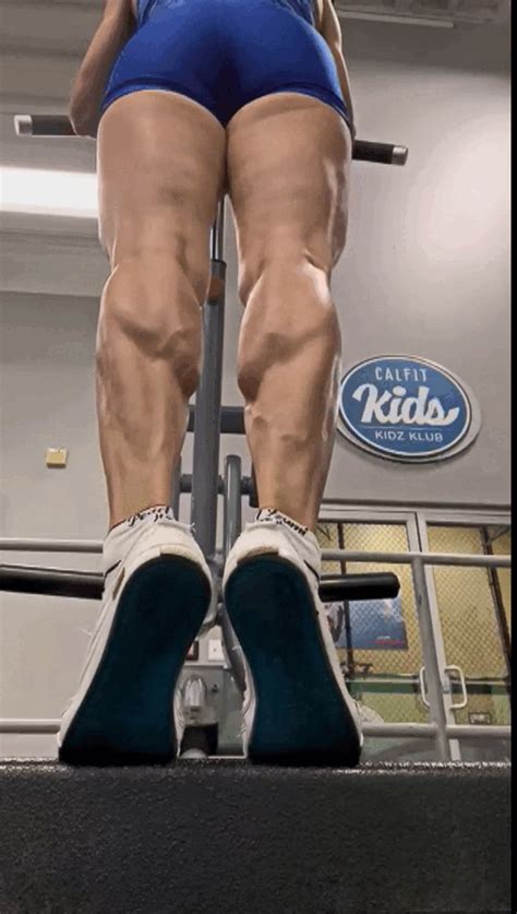 Blue Tight Shorts Standing Calf Raise Machine Spontaneous Calves