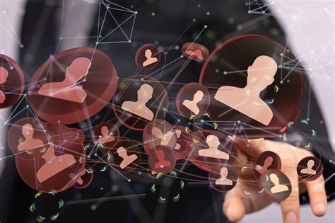 Businessman Presenting A 3d Rendered Hologram Of A Network With Person Icons In A Cyberspace