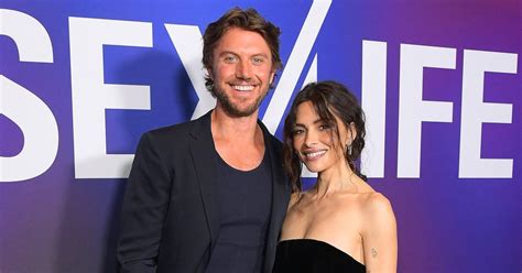 Adam Demos And Sarah Shahi Pack On Pda At Sexlife Season 2 Premiere