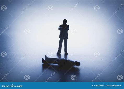 Defeated Man And A Man Figure Standing Behind Him Stock Image Image