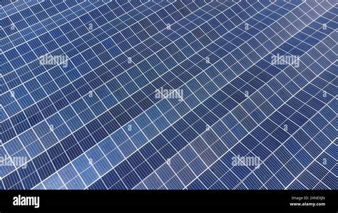 Close Up Of An Extensive Array Of Blue Solar Panels Installed On Tilt